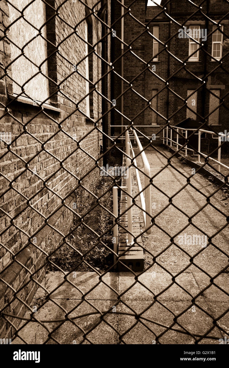 Fenced off building Stock Photo - Alamy