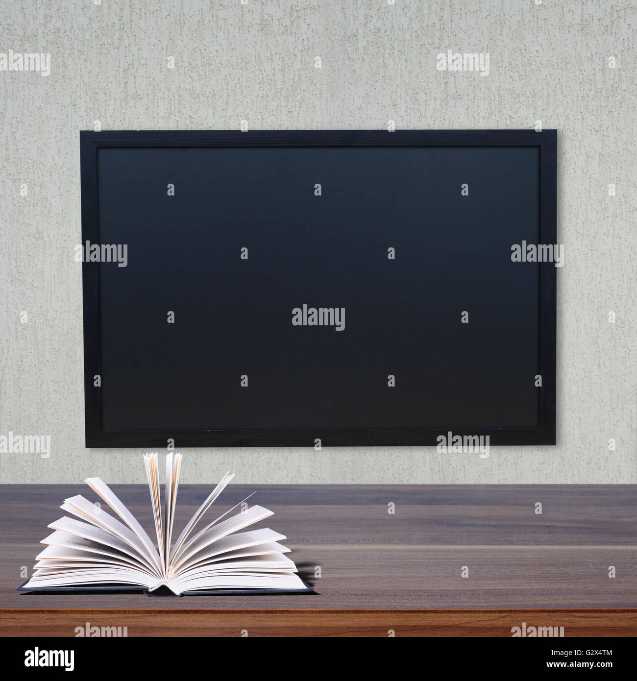 School class with school board and school desk with open classbook ...