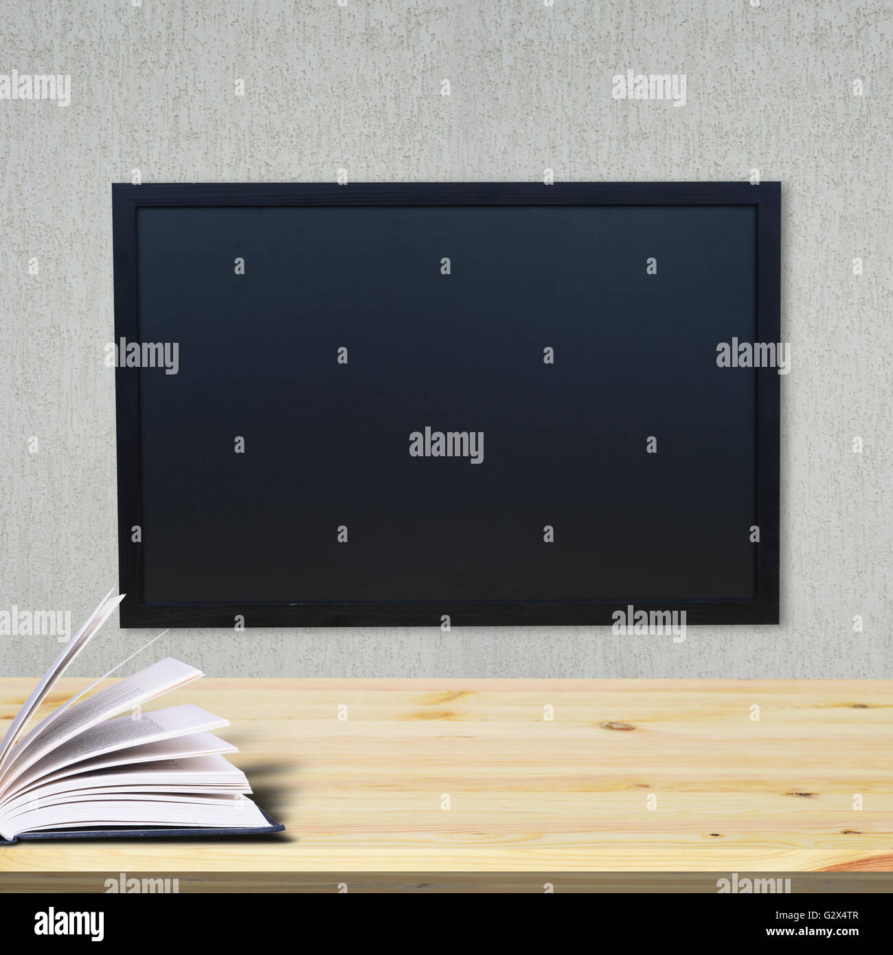 School class with school board and school desk with open classbook ...