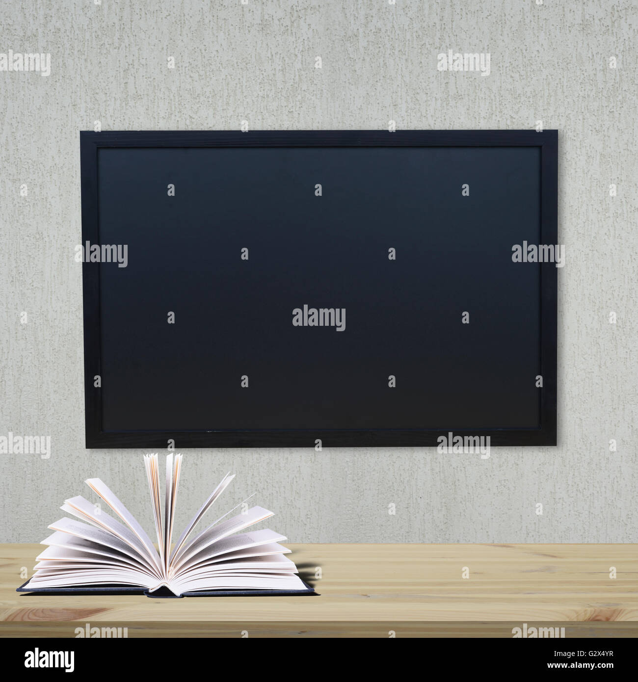 School class with school board and school desk with open classbook ...