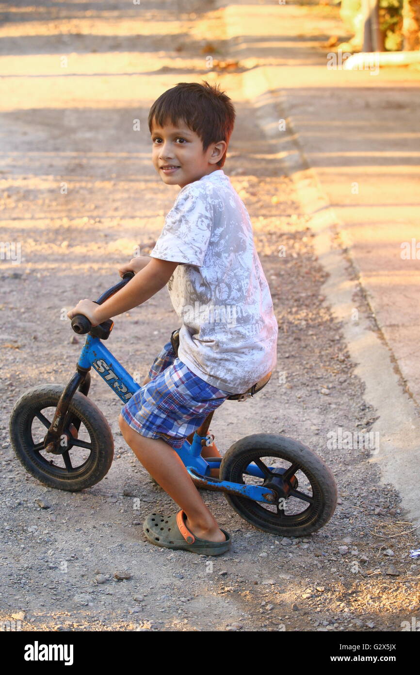 Boy blue bike hi-res stock photography and images - Alamy