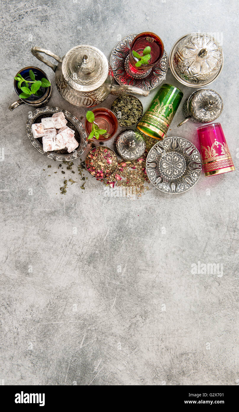 Tea with mint leaves and traditional turkish delight. Oriental ...