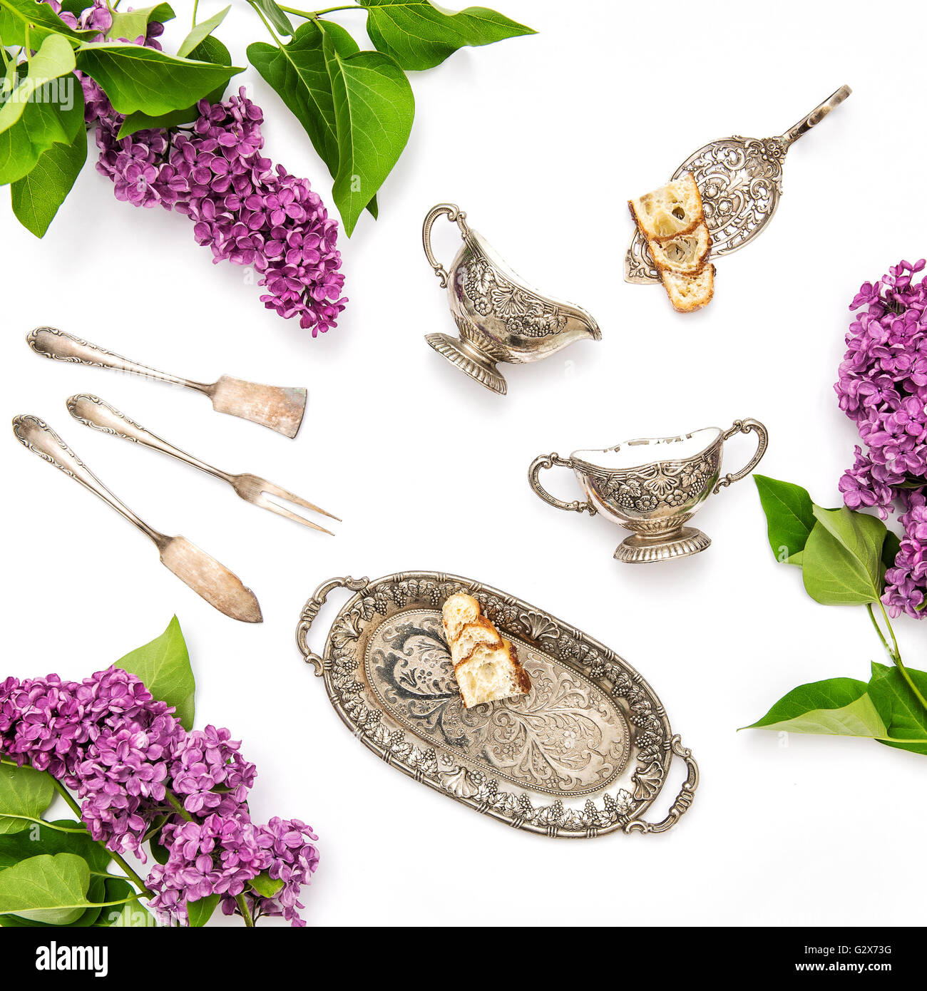 Lilac flowers. Coffee tea pie table dishes. Flat lay background. Top ...