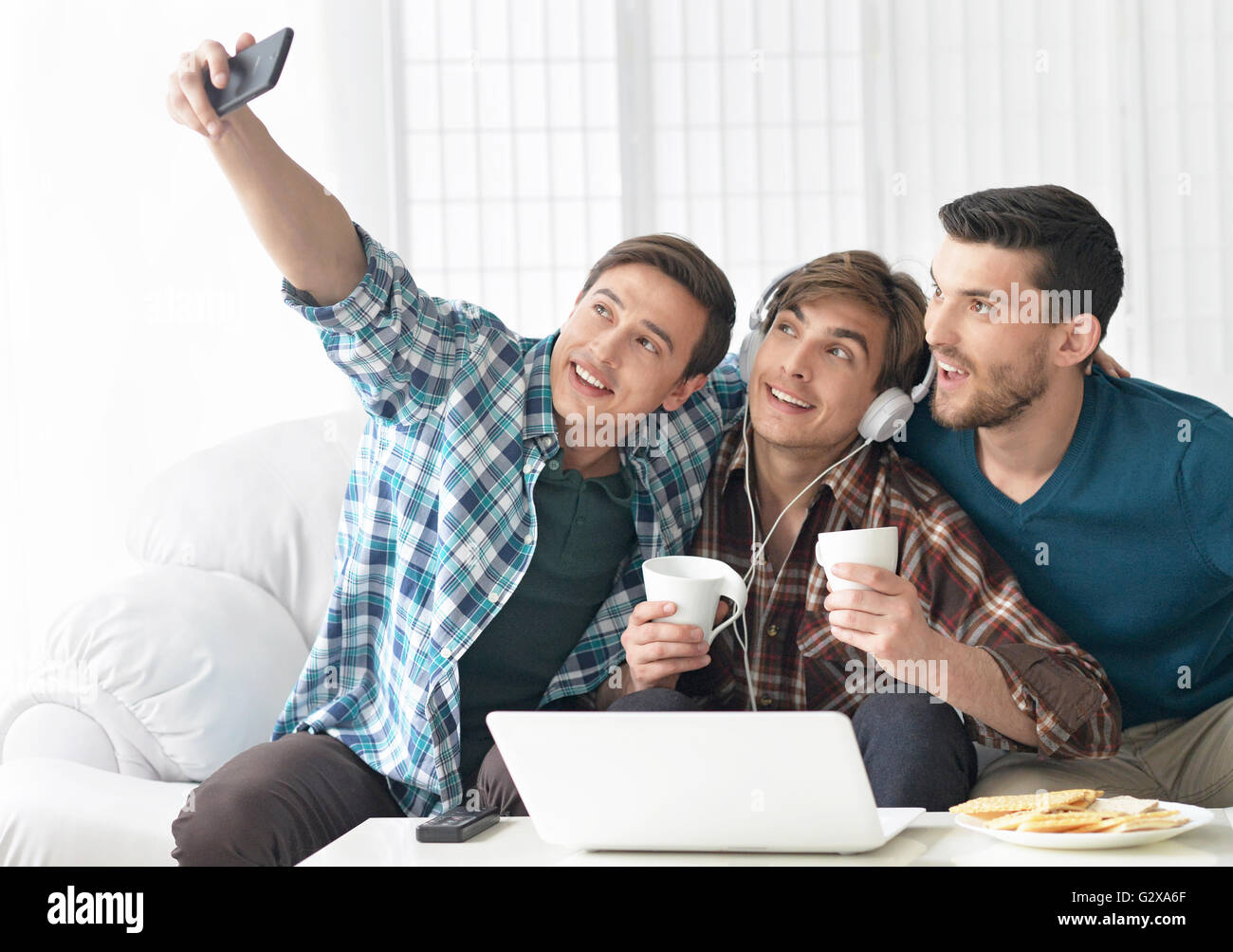 men having fun taking selfie photo Stock Photo - Alamy
