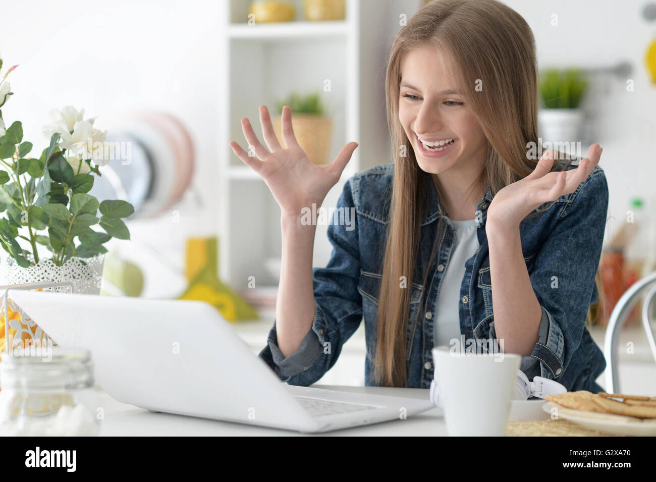 happy girl using laptop Stock Photo - Alamy