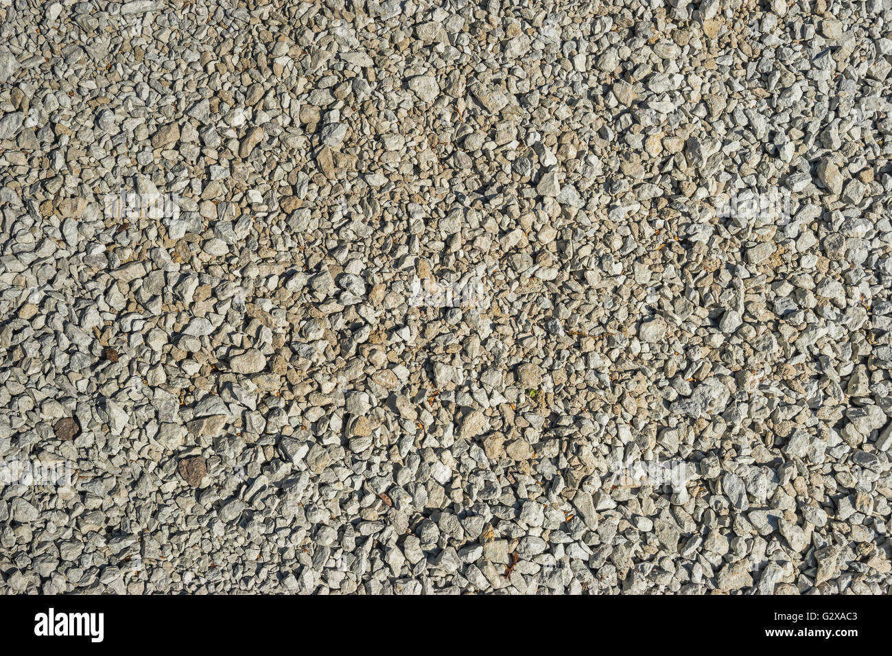 crushed stones, many small stones, gray color Stock Photo - Alamy