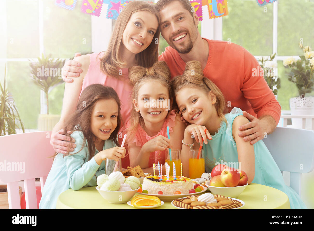happy family with tasty food Stock Photo - Alamy