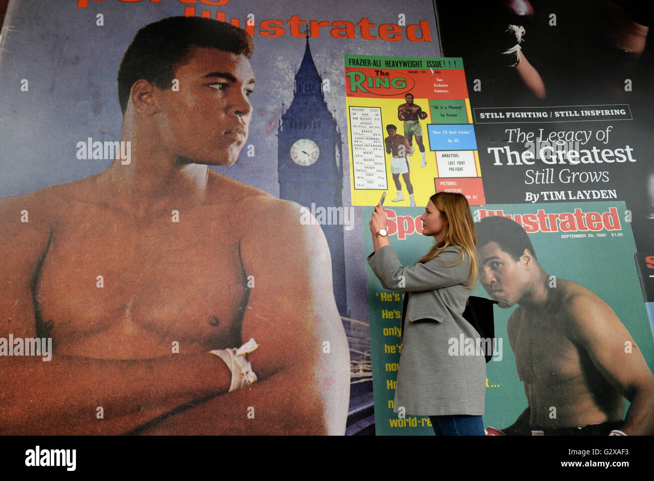 Ellie Saunders, 23, takes photographs at the Muhammad Ali at the 02 ...