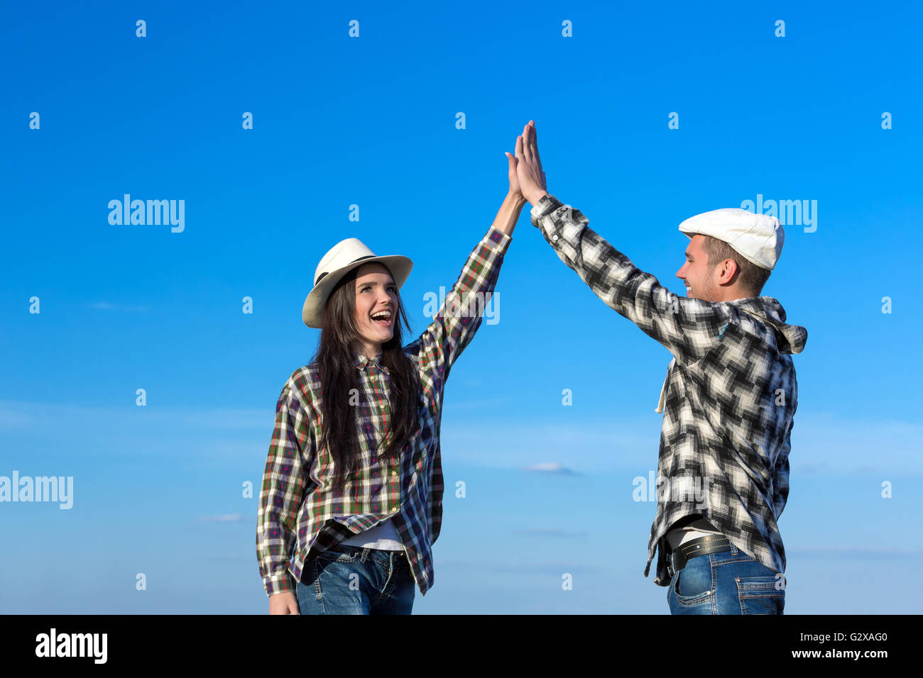 Man and Woman Clapping Hands Each Other Stock Photo - Alamy