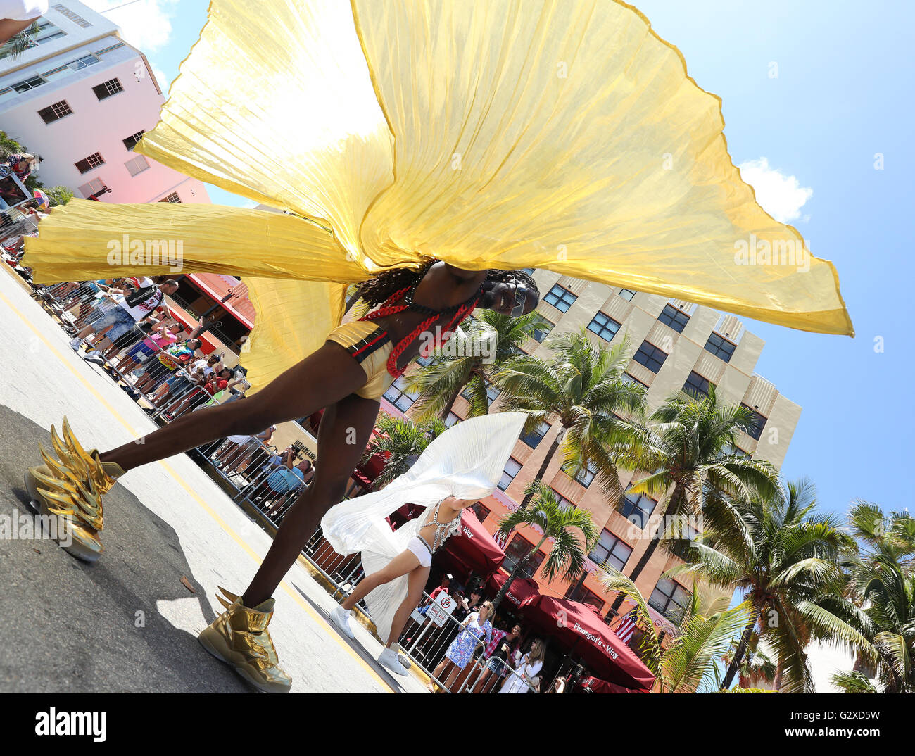MIAMI BEACH, FLORIDA - APRIL 10: Performer parade on Ocean Drive as ...