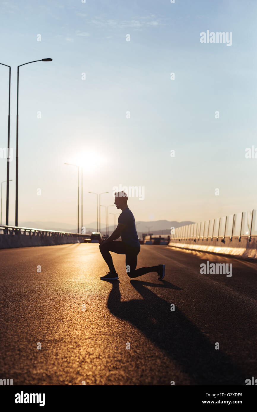 Male runner silhouette, Man running into sunset, colorful sunset sky ...