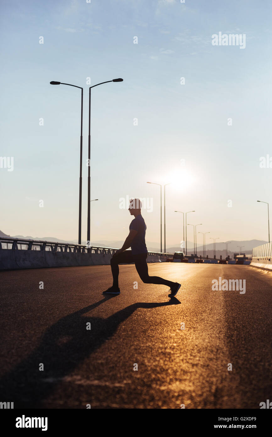Male runner silhouette, Man running into sunset, colorful sunset sky ...