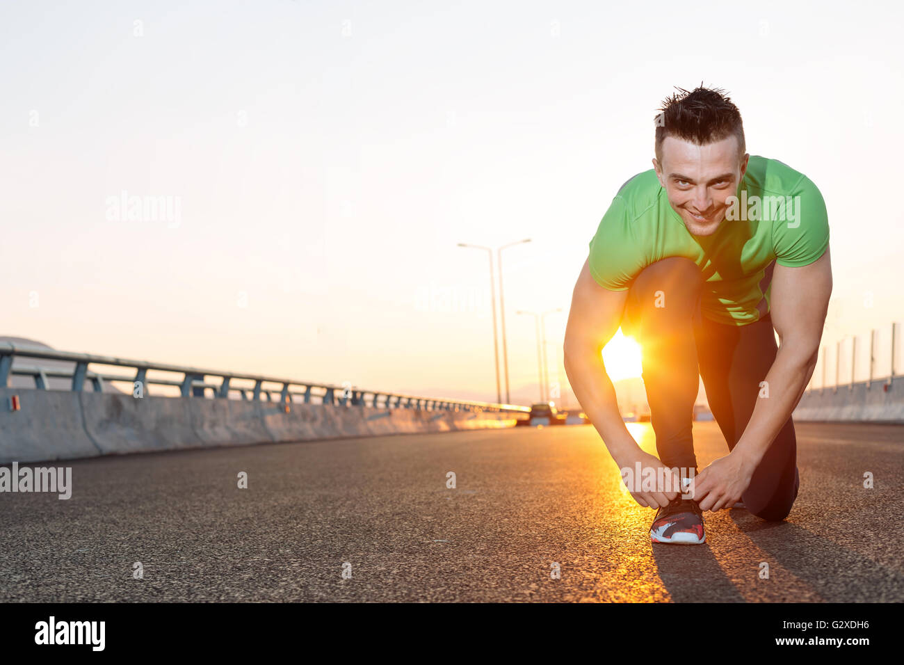 Athlete running on highway hi-res stock photography and images - Alamy