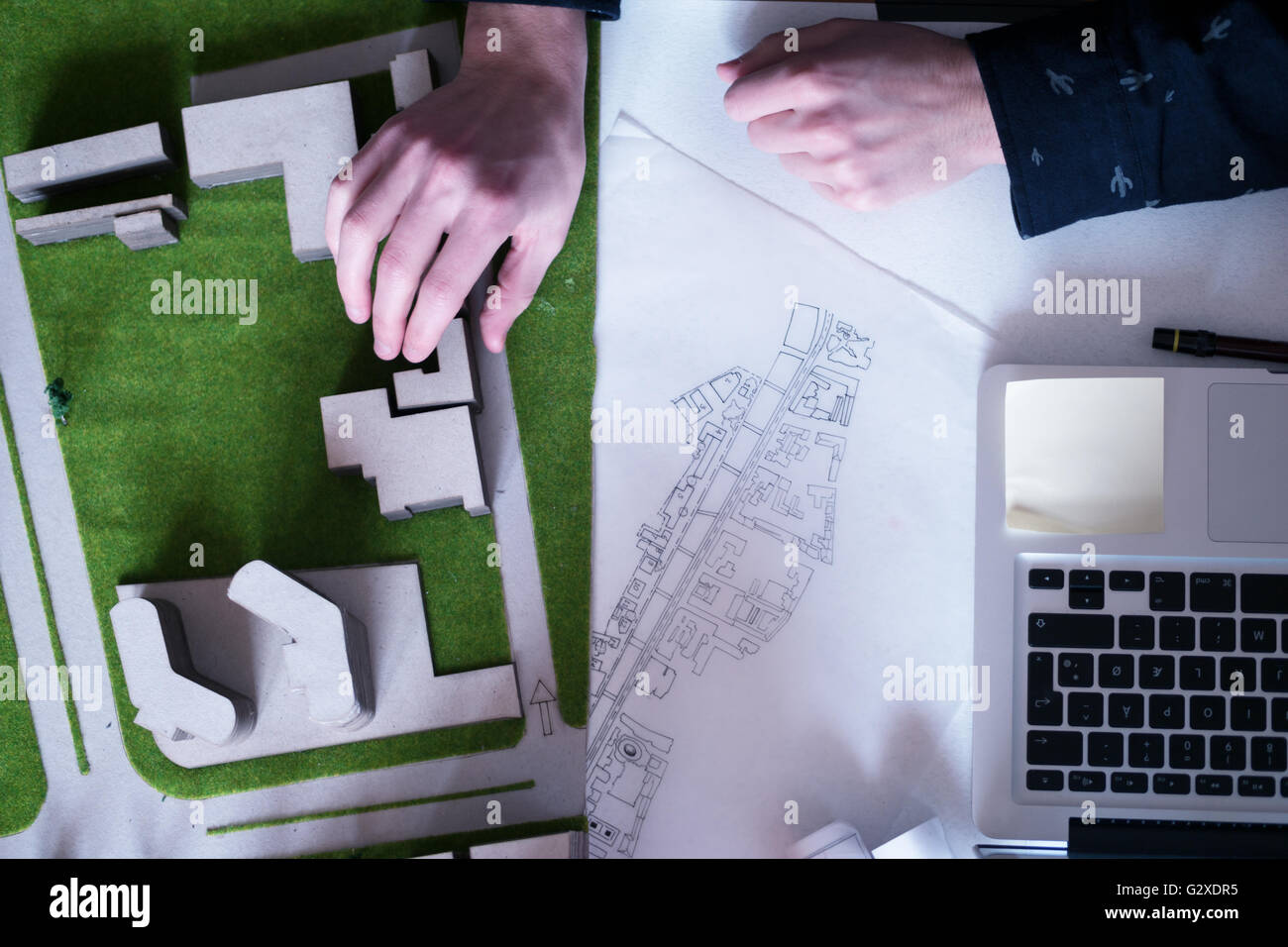 Architect working on blueprint. Architects workplace - architectural ...