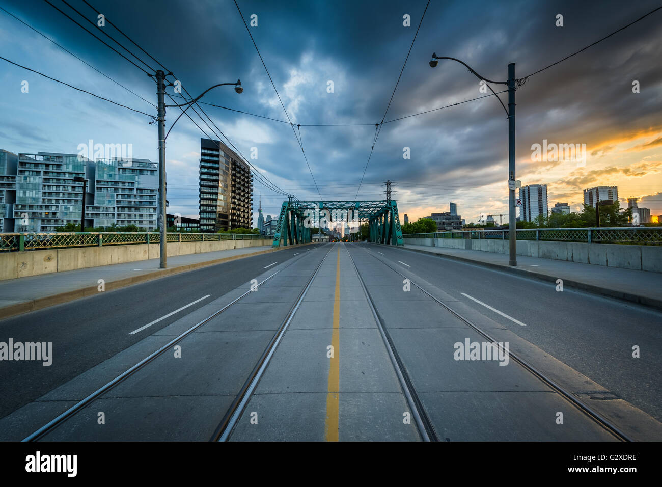 Sunset over the Queen Street Bridge over the Lower Don River, in ...
