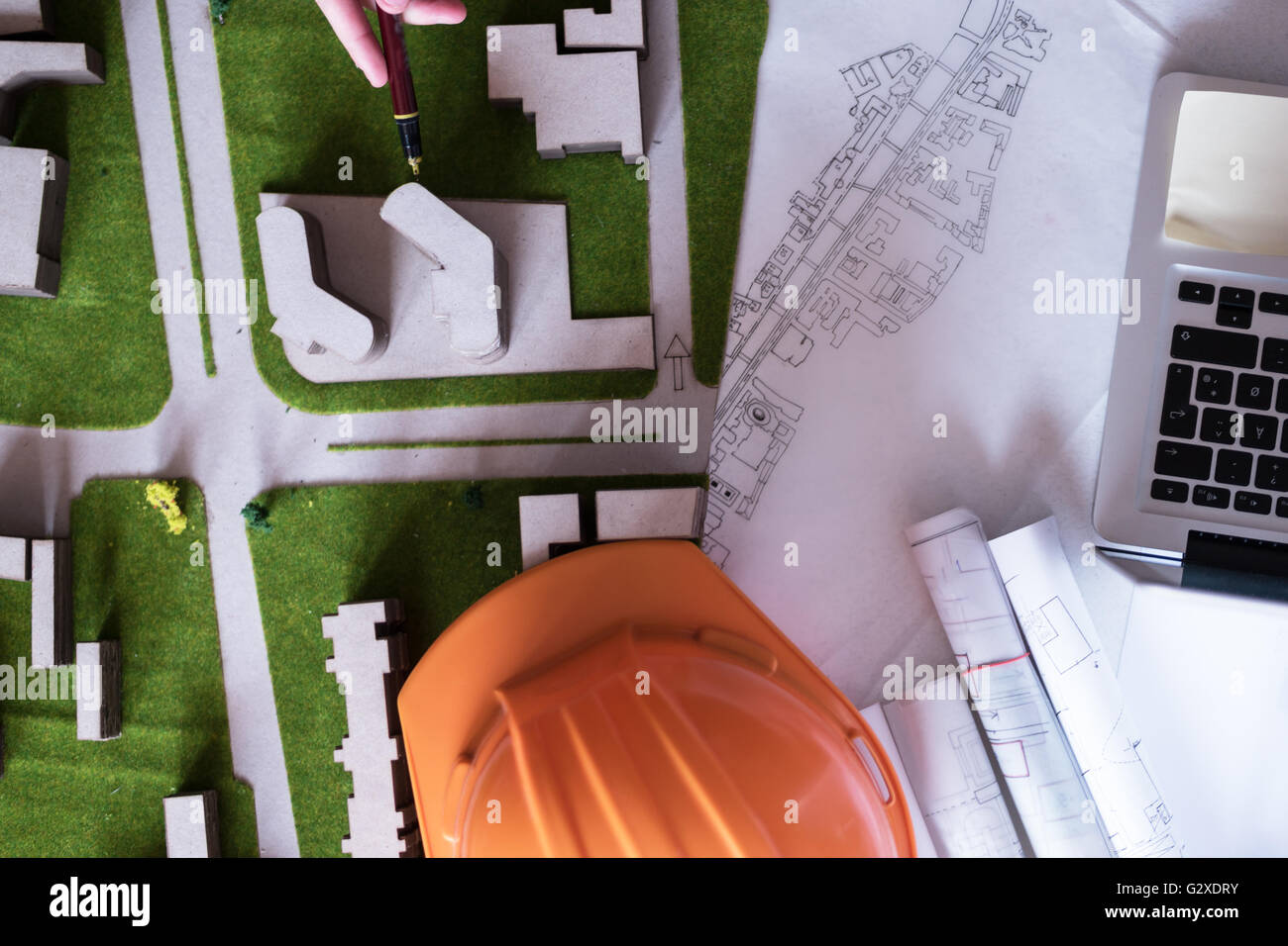 Architect working on blueprint. Architects workplace - architectural ...