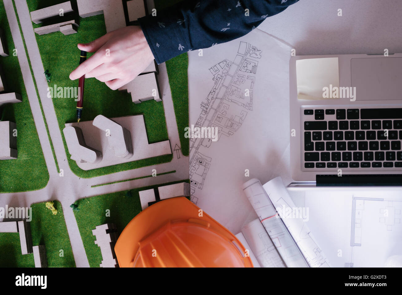 Architect working on blueprint. Architects workplace - architectural ...