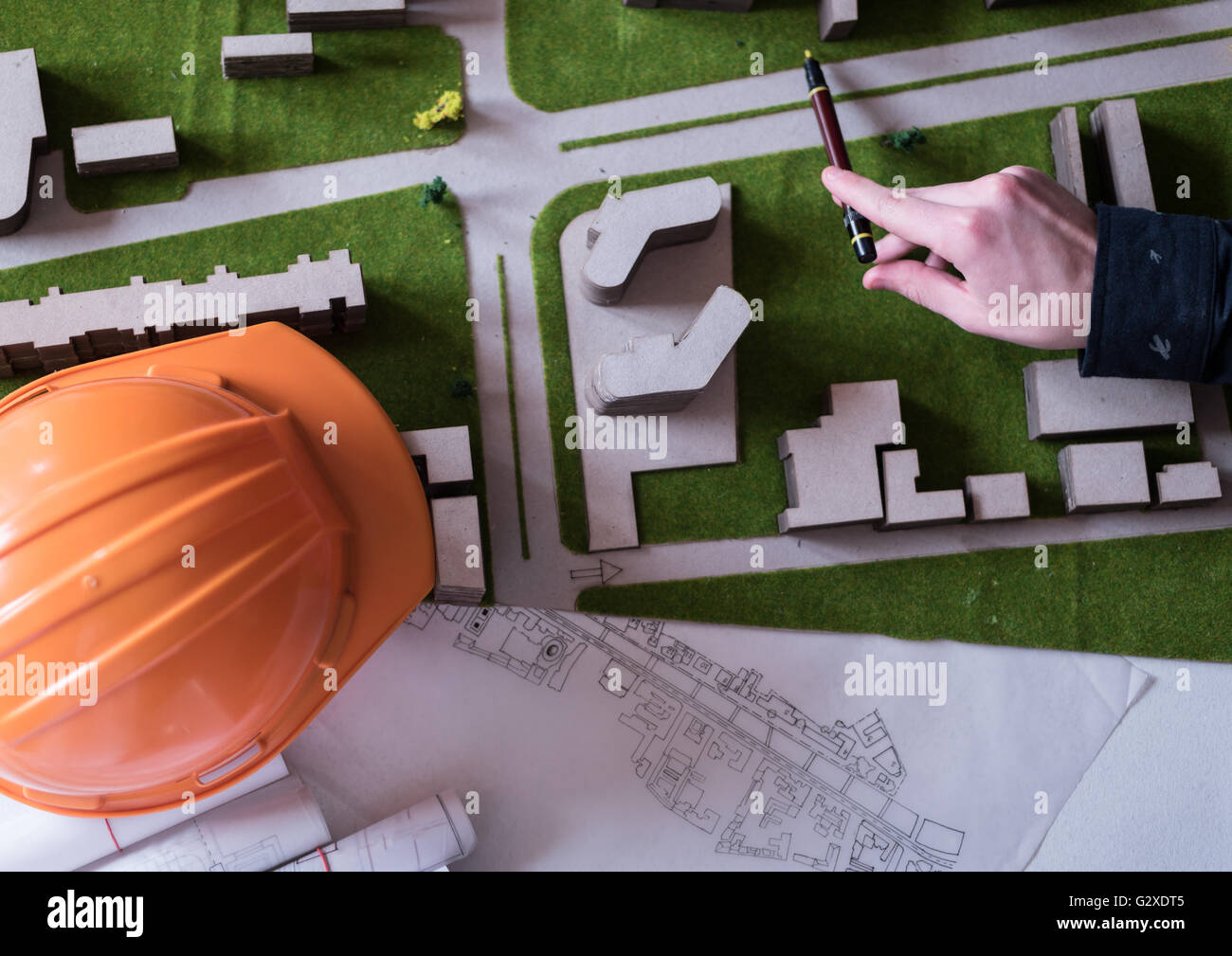 Architect working on blueprint. Architects workplace - architectural ...