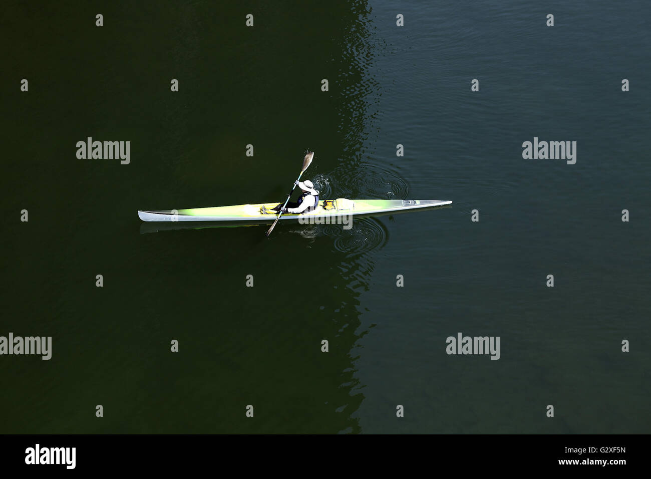 Paddling colorful kayak on river from above Stock Photo - Alamy