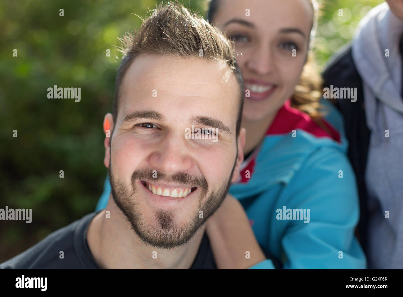 Couple having fun after jogging Stock Photo - Alamy