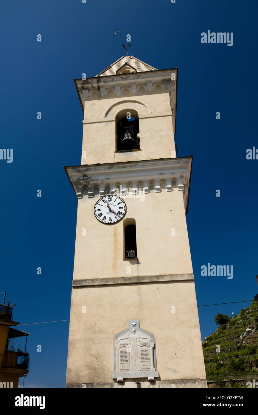 Belltower outside the church in the hilltop square of Manarola, one of ...