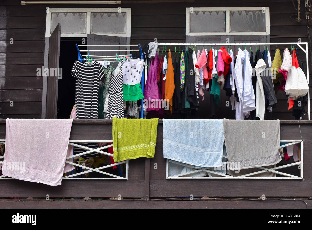 Clothes drying on balcony Luang Prabang Laos Stock Photo - Alamy
