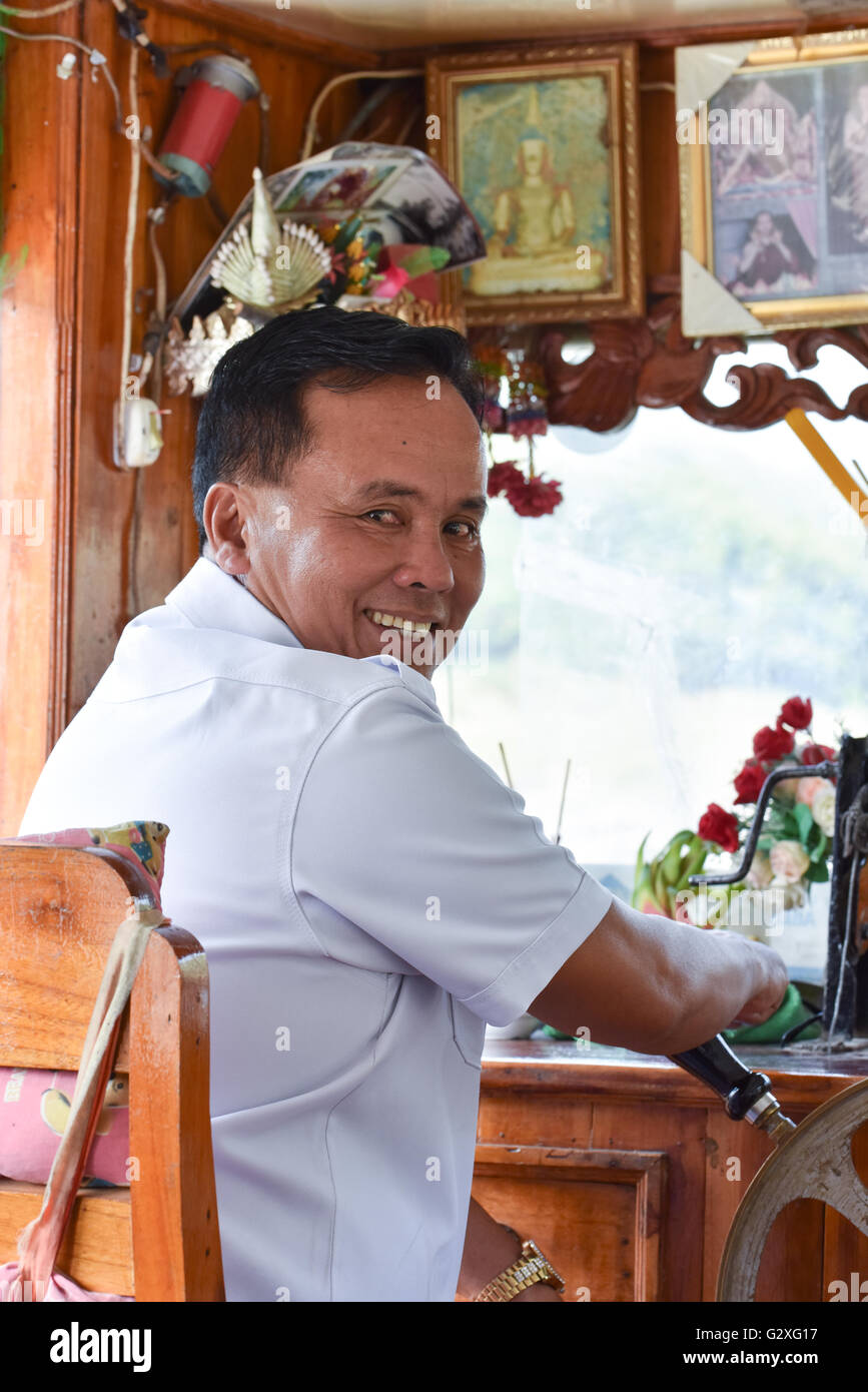Captain of a Slow Boat on the Mekong River Laos Stock Photo - Alamy