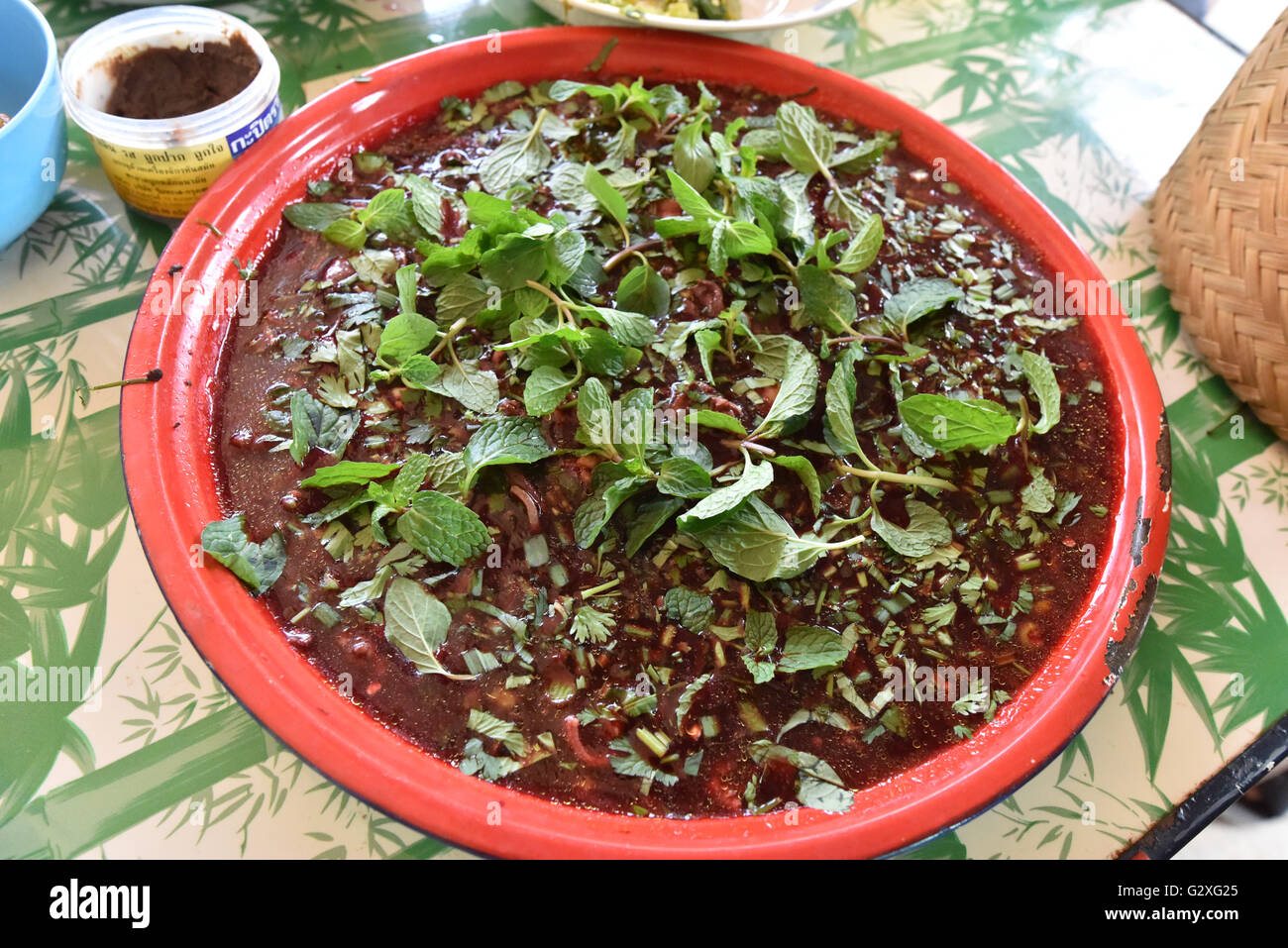 Raw cow blood dish Laos Stock Photo - Alamy