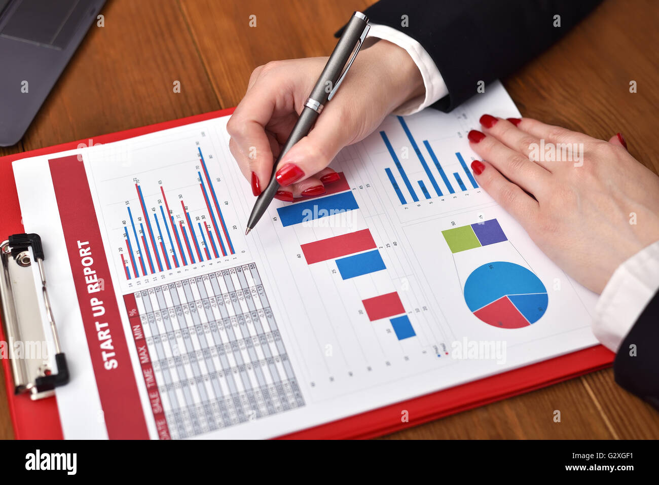 Woman checks paperwork work hi-res stock photography and images - Alamy