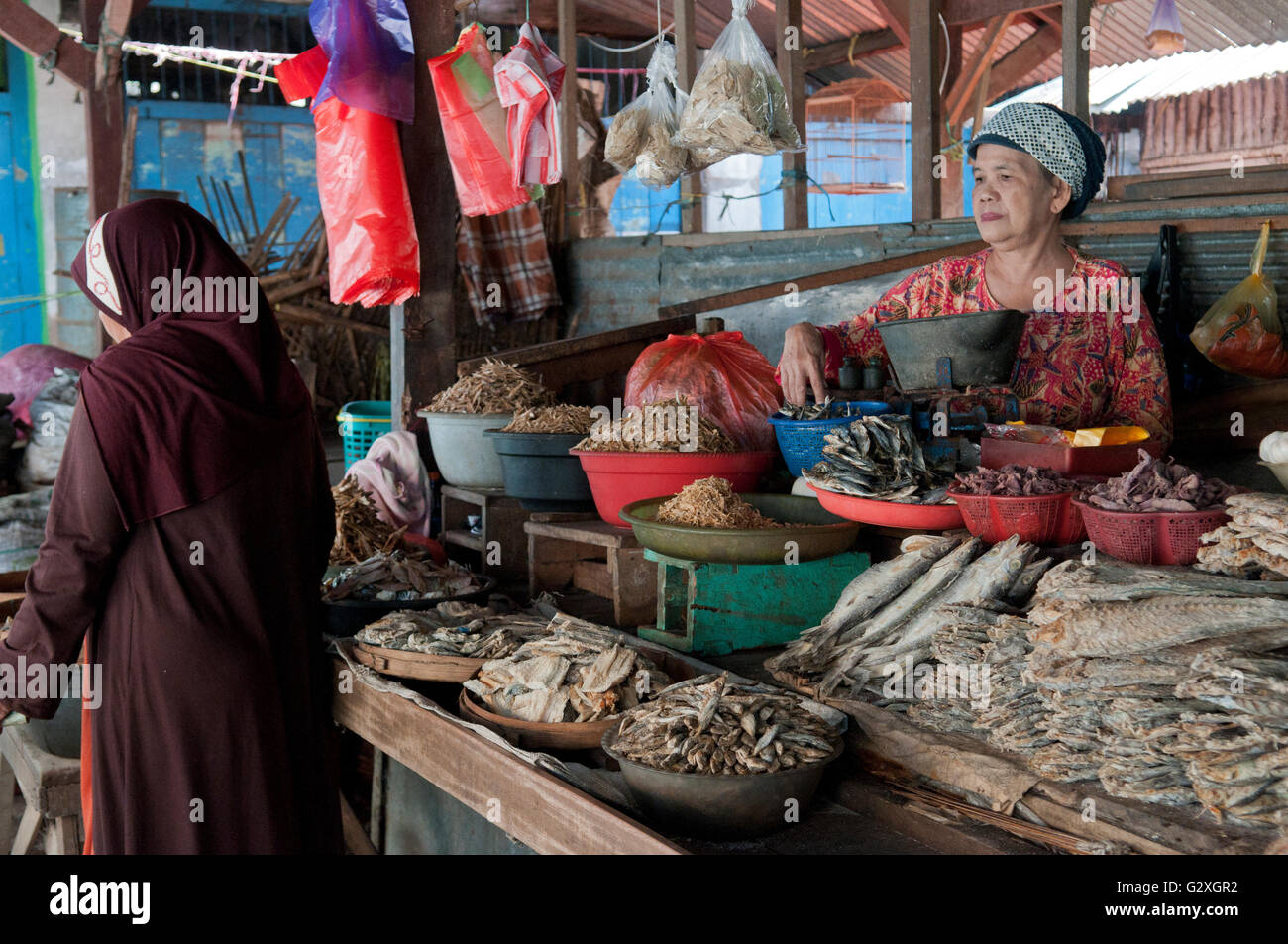 Java, Banyuwangi Market, woman selling fish Stock Photo - Alamy