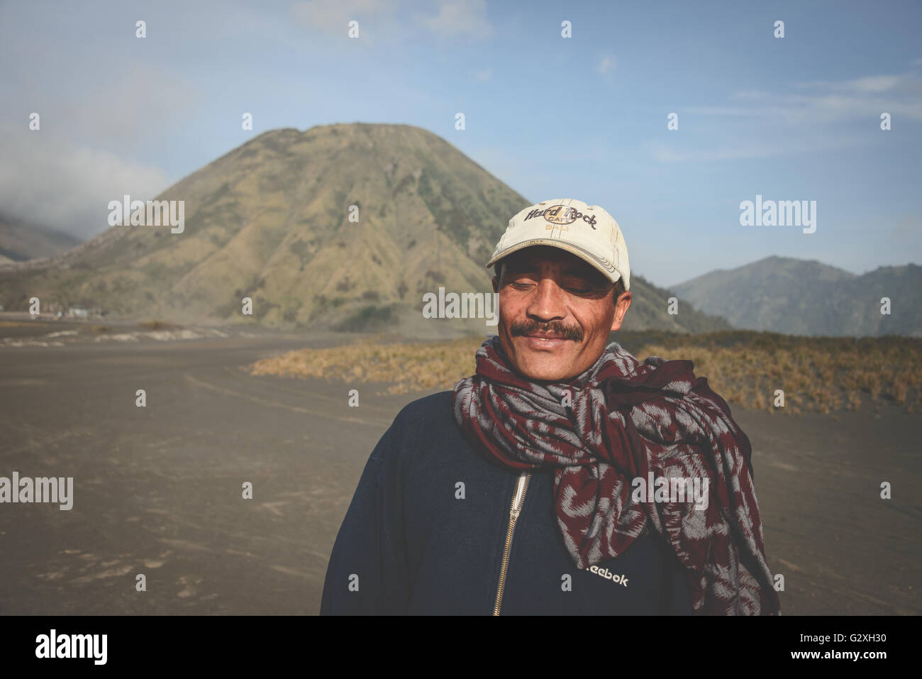 Local guide portrait infront of the Bromo volcano Stock Photo - Alamy