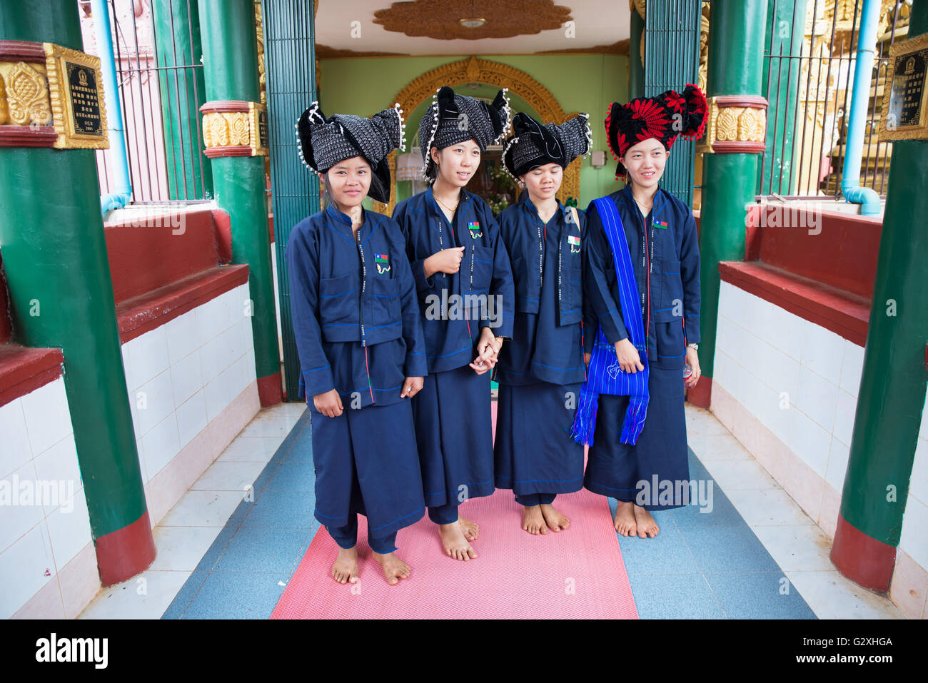 Four Pa'O ladies visiting pagoda with festive attire, Kakku, Shan State ...