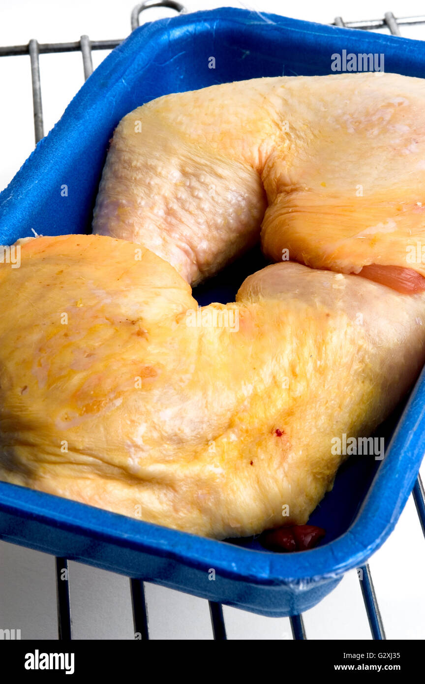 chicken legs in a supermarket presentation tray Stock Photo - Alamy