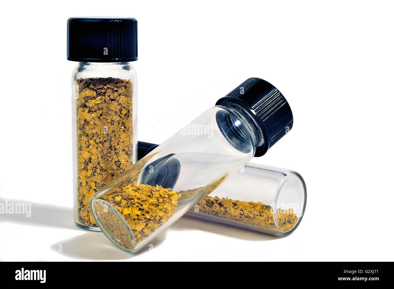 Gold flakes in a bottle hi-res stock photography and images - Alamy