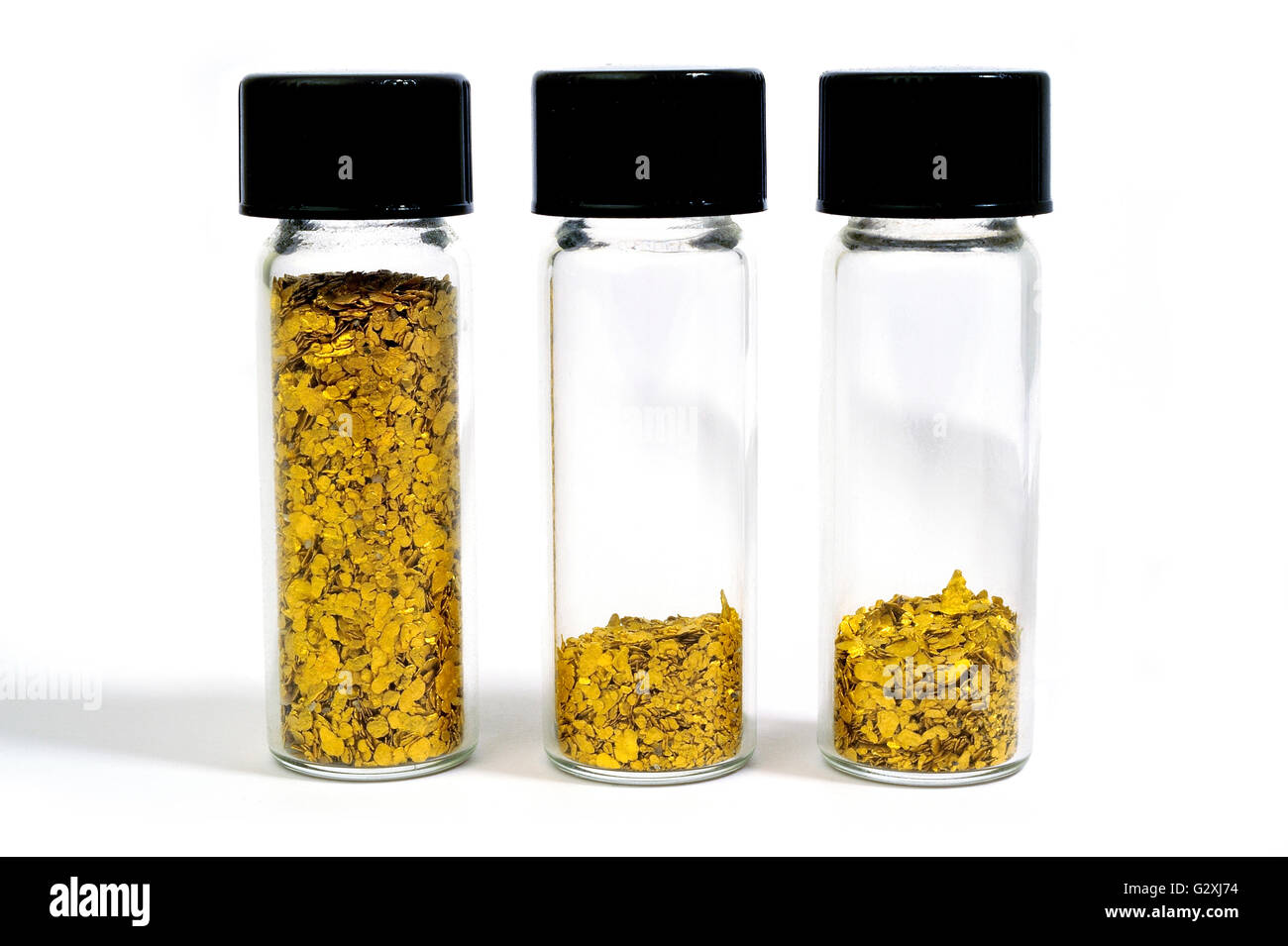 Gold flakes in a bottle hi-res stock photography and images - Alamy