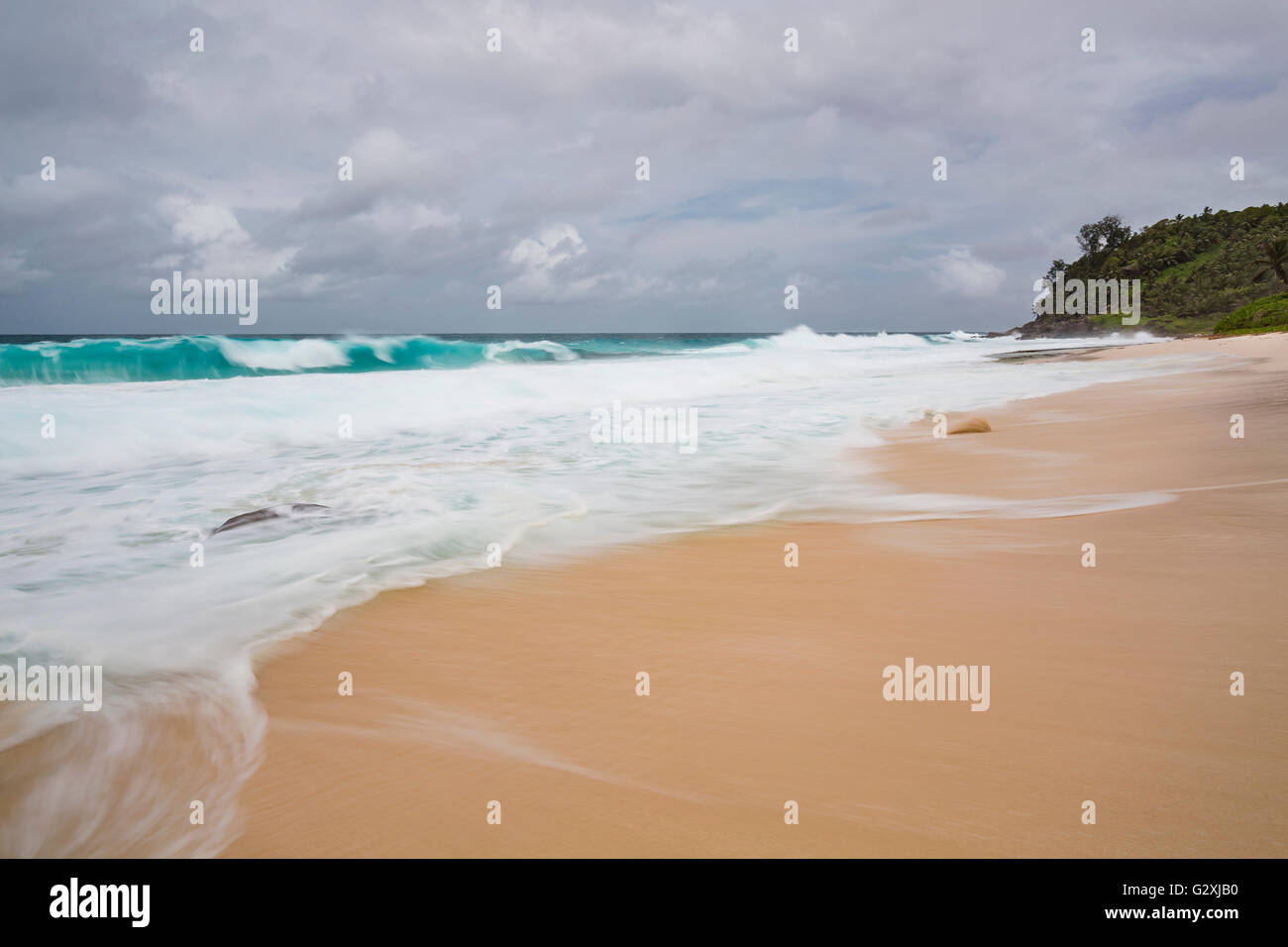 Long exposure of Anse Bazarca in the south of Mahe, Seychelles during a ...