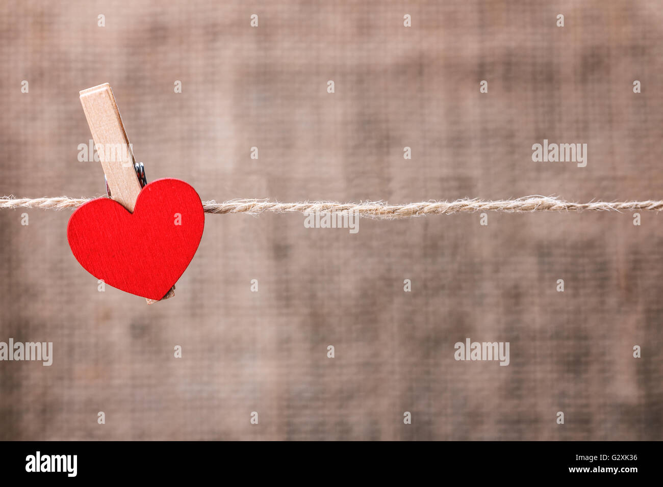 heart clothespin rope a symbol of Valentine's Day Stock Photo - Alamy