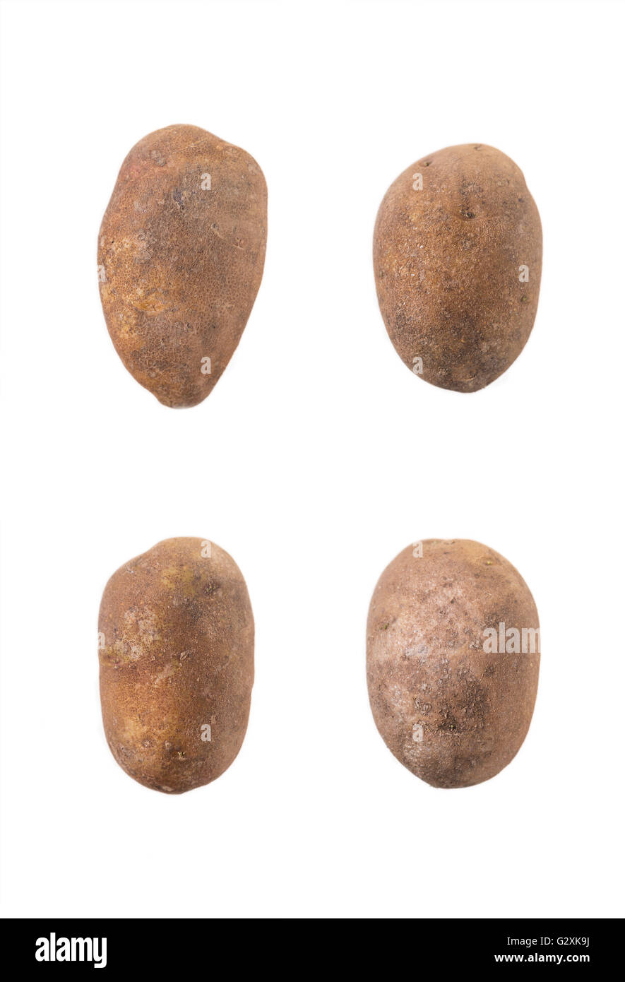 Four potatoes isolated on white background Stock Photo - Alamy