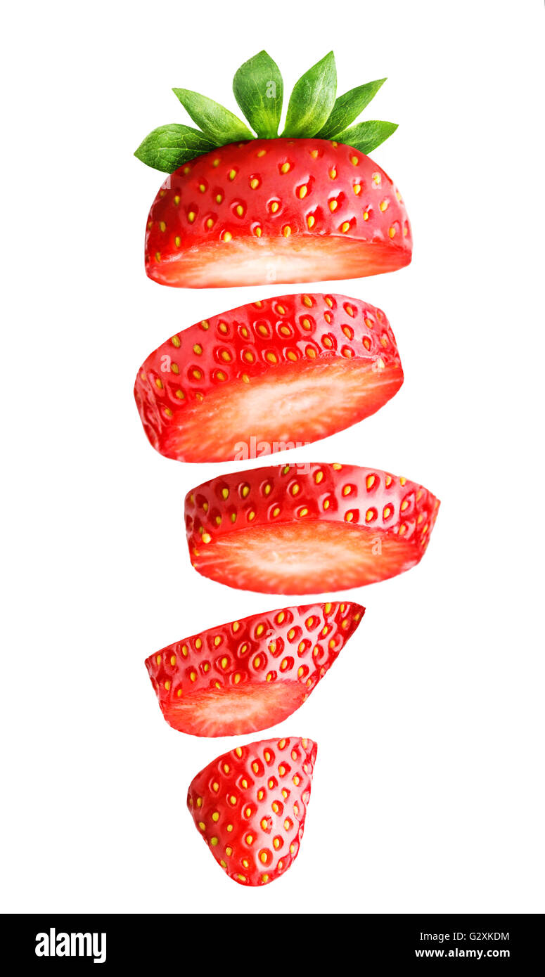 Falling sliced strawberry isolated on white Clipping Path Stock Photo ...