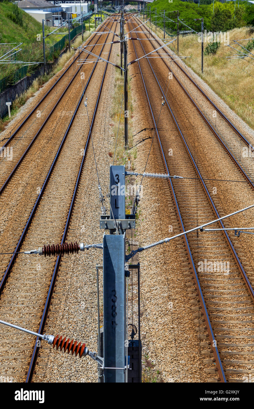 empty railroad with posts and wires in summer day Stock Photo - Alamy