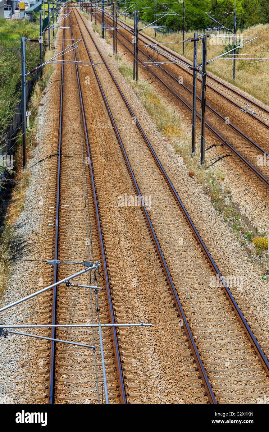 empty railroad with posts and wires in summer day Stock Photo - Alamy