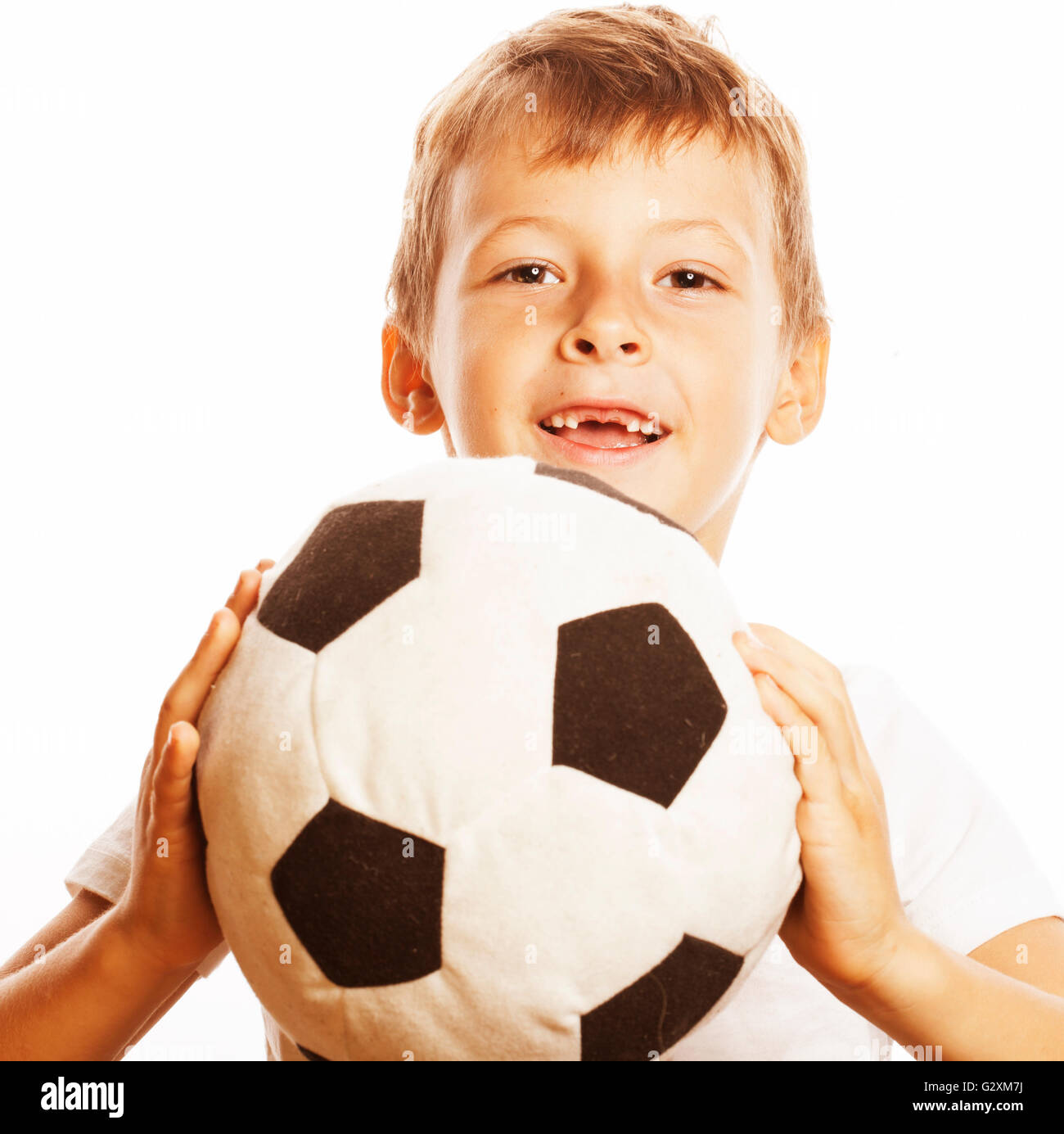 little cute boy playing football ball isolated on white close up ...