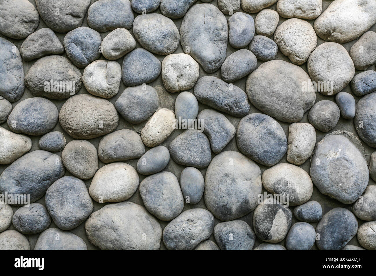cobble-stone in cement Stock Photo - Alamy