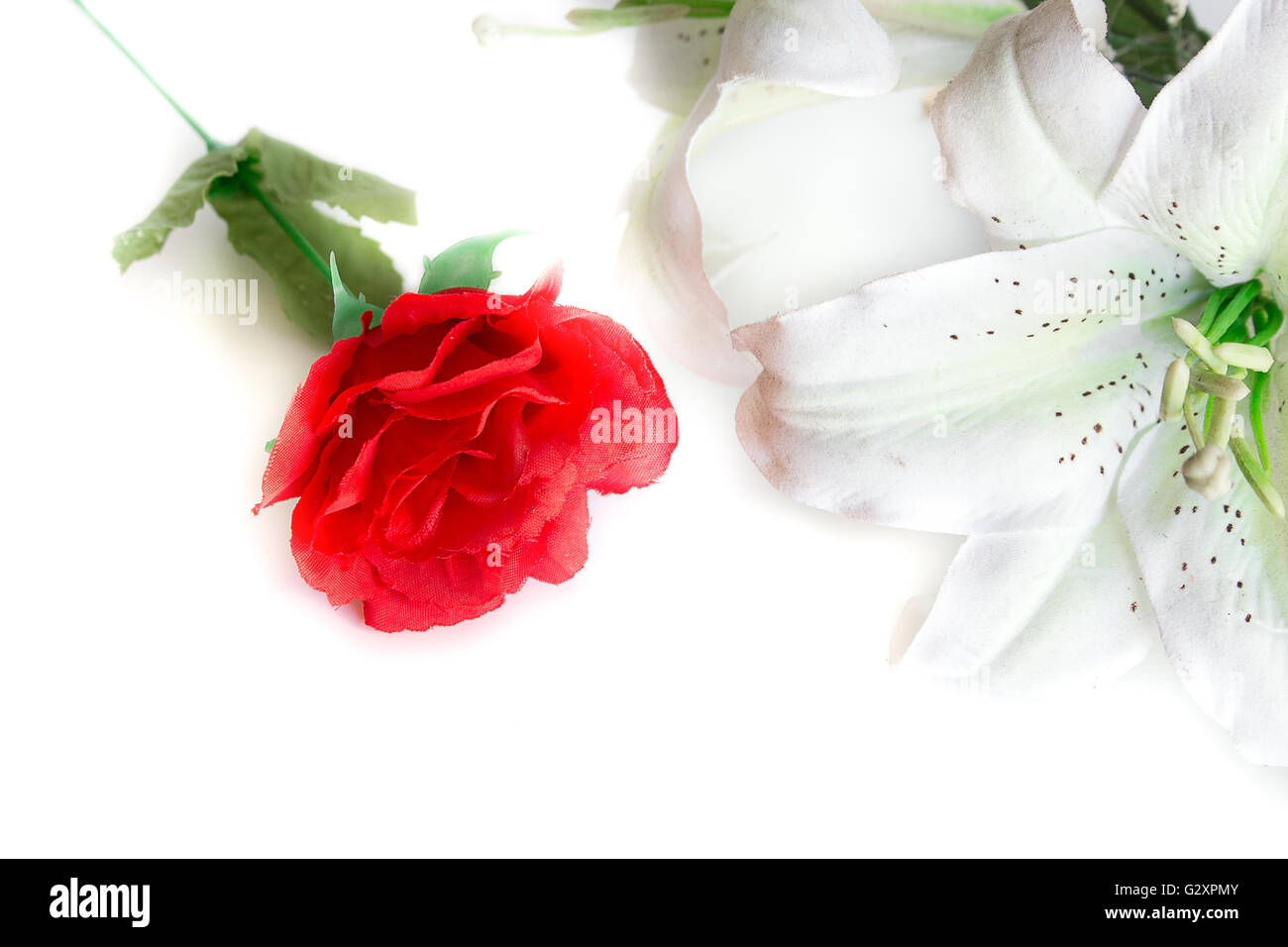 Red plastic roses hi-res stock photography and images - Alamy