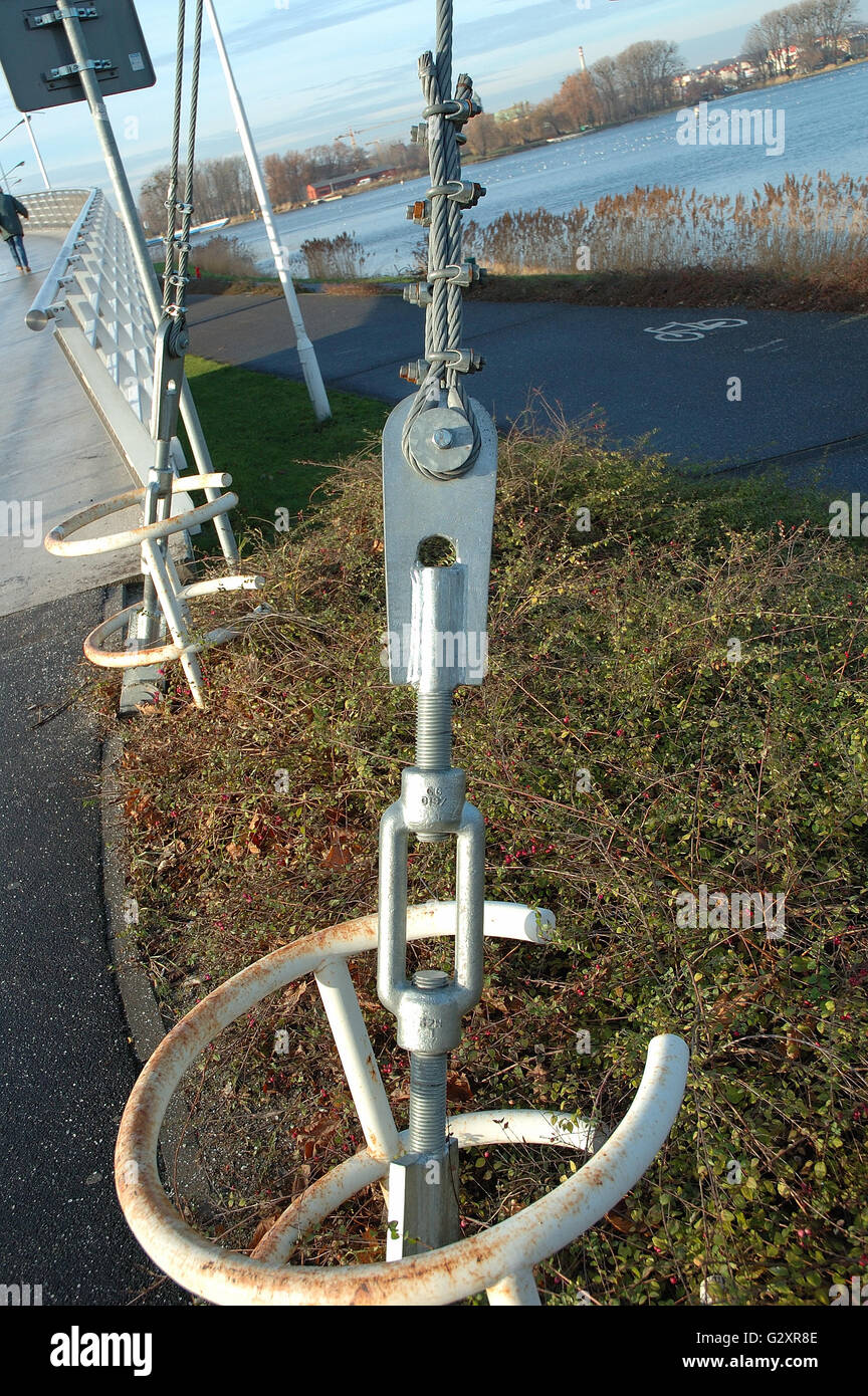 Steel rope connection to ground Stock Photo - Alamy