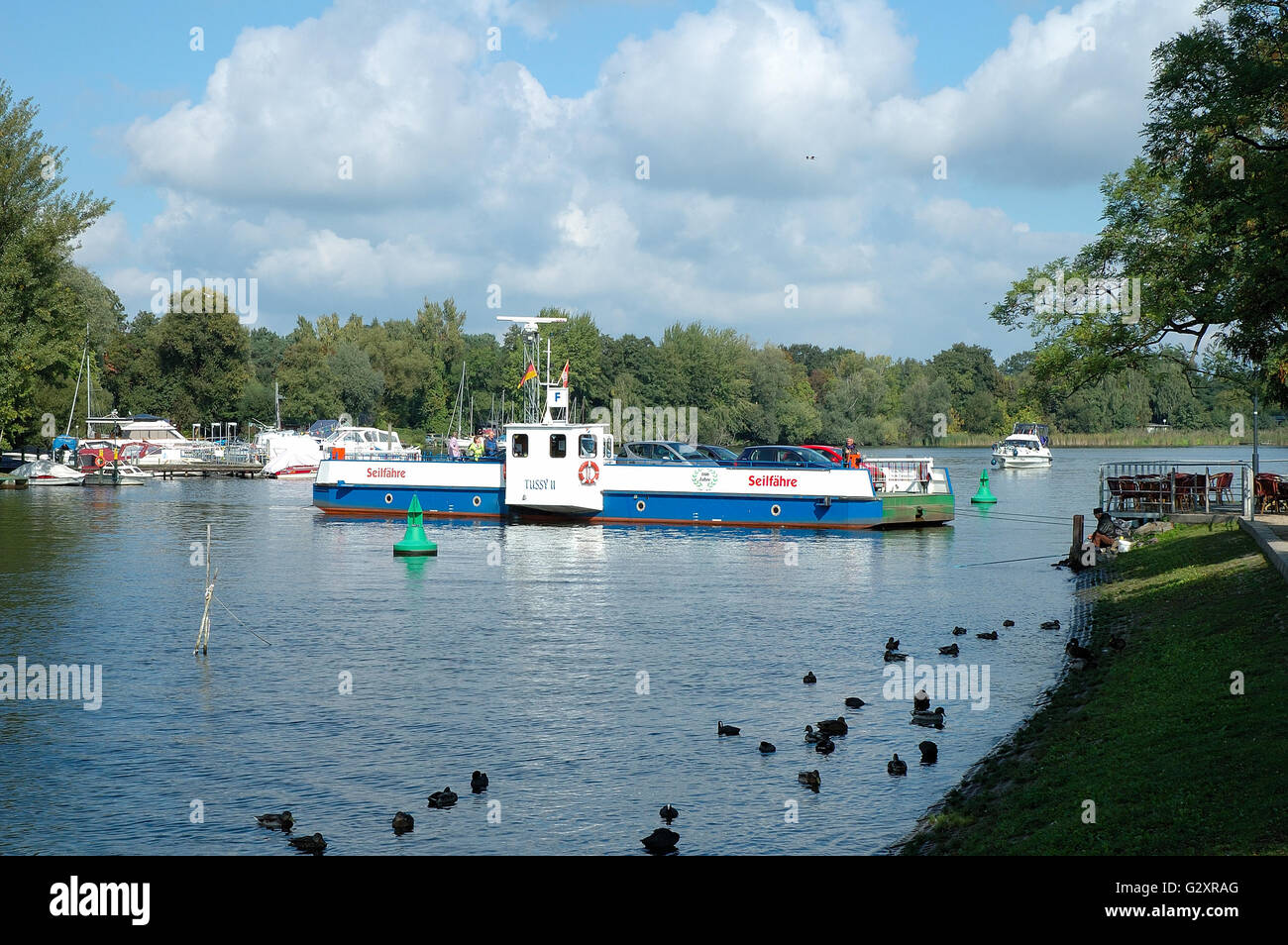 CAPUTH, GERMANY - SEPTEMBER 21: Car and passenger ferry in Caputh city ...