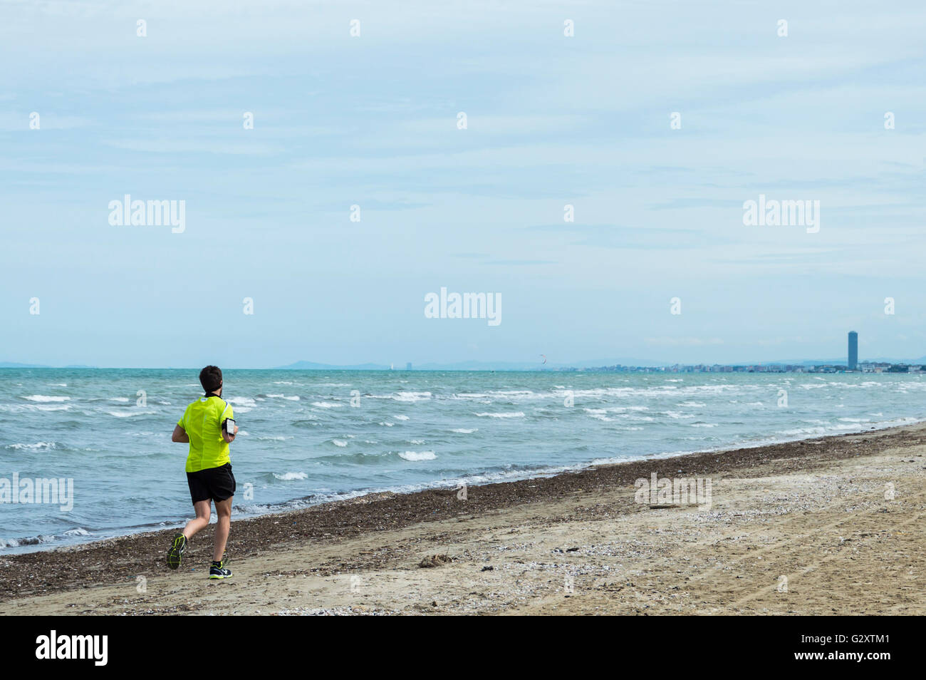 Jogging on a beach hi-res stock photography and images - Alamy
