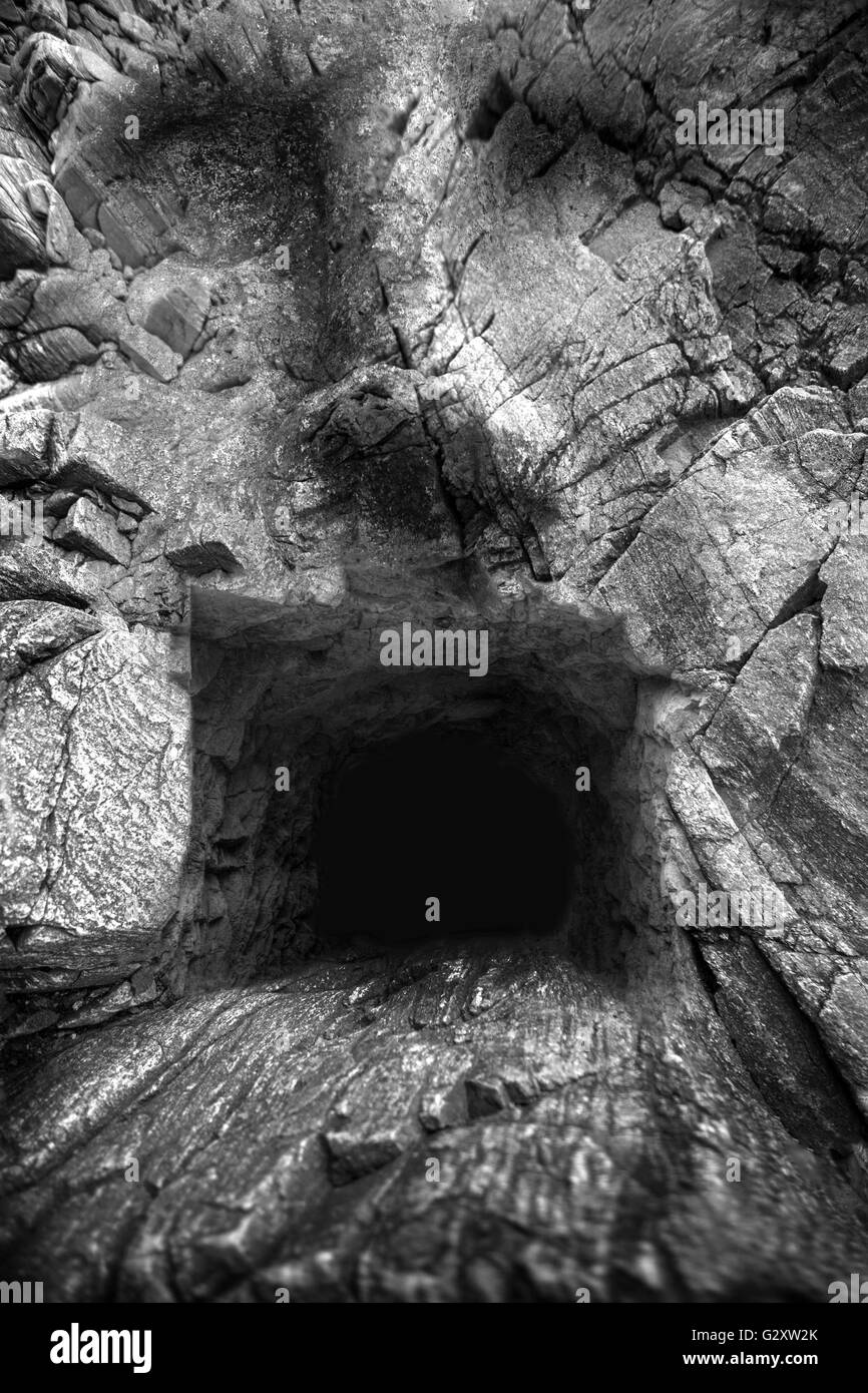 cave in the mountains, a human face. fantastic picture Stock Photo - Alamy