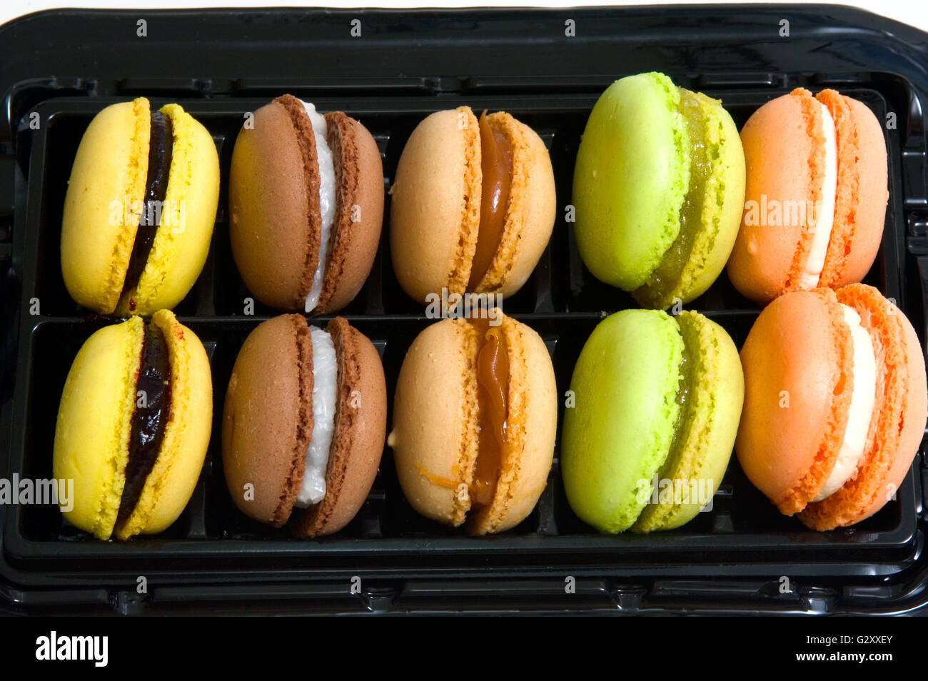 still life of colorful macaroons in studio on white background Stock ...