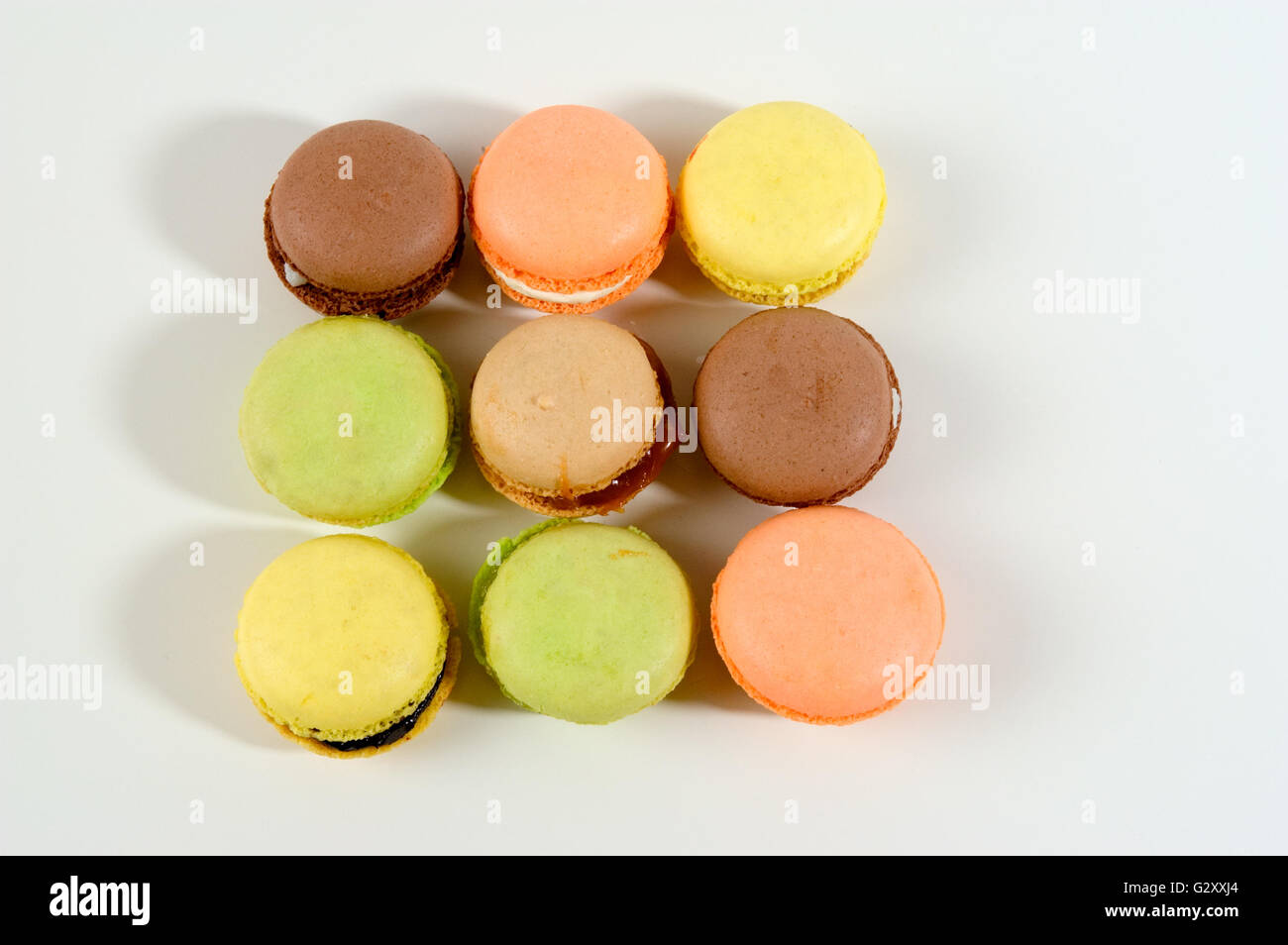 still life of colorful macaroons in studio on white background Stock ...